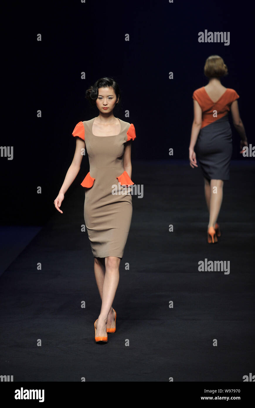 Models display new creations by Chinese designer Tanya Wang Yannan in ...