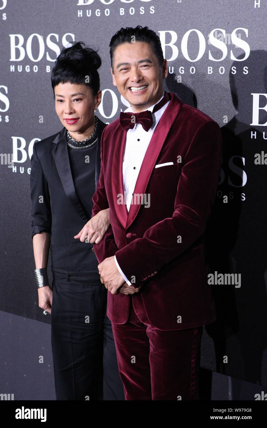 Hong Kong actor Chow Yun-fat and his wife pose during a Hugo Boss ...
