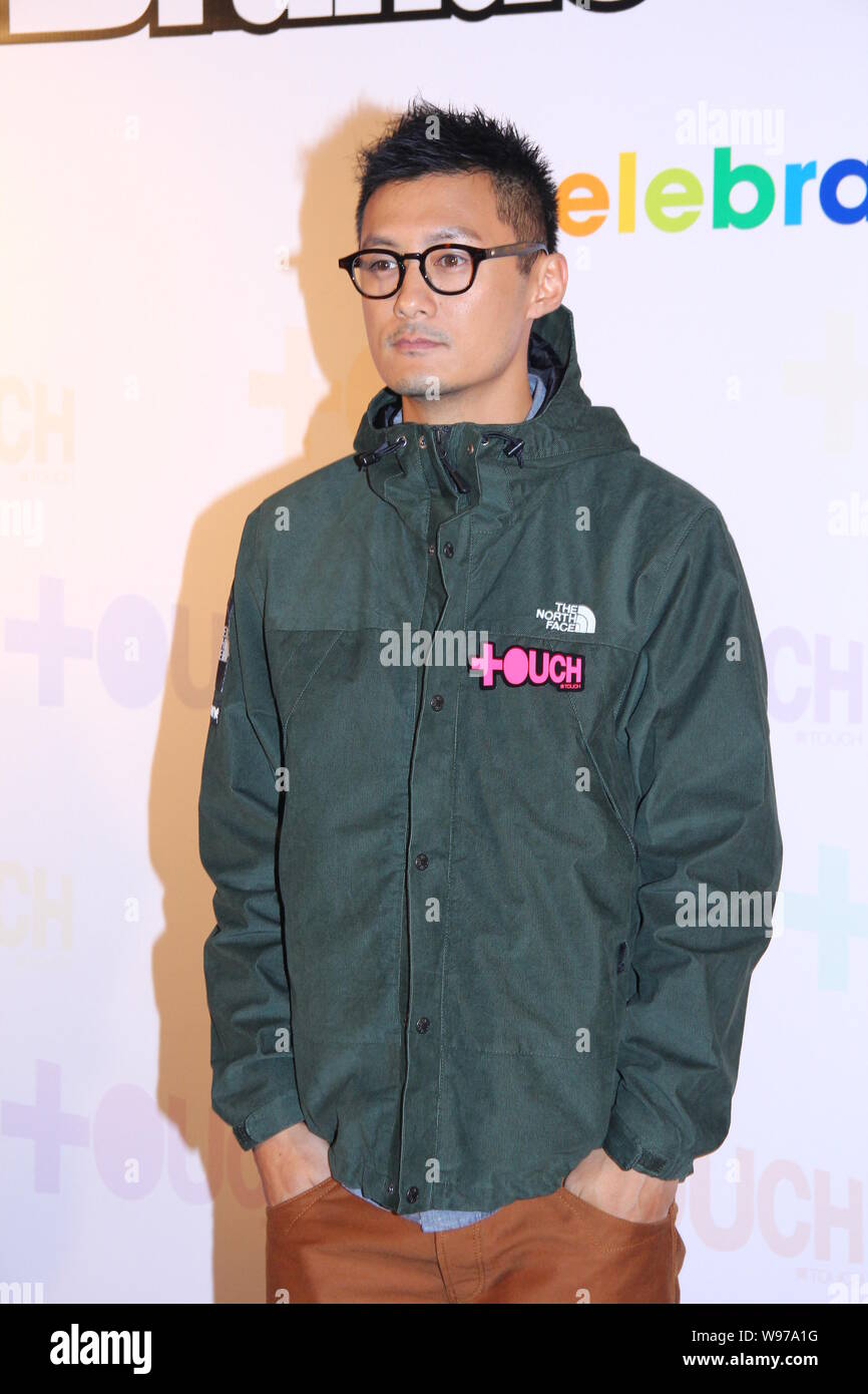 Hong Kong singer and actor Shawn Yu poses as he arrives for a fashion ...