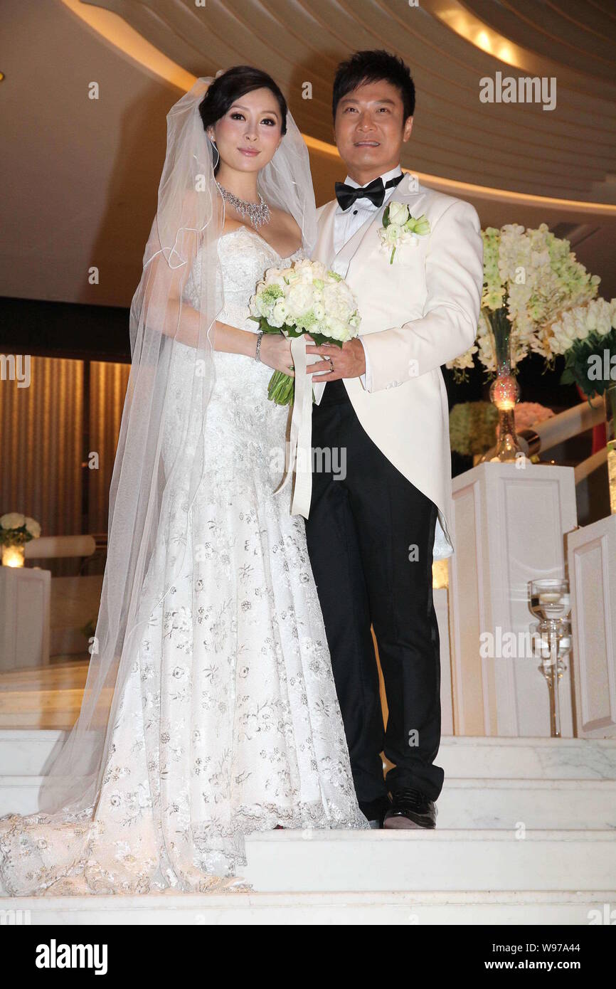 Hong Kong actor Chin Ka Lok, right, poses with his pregnant actress ...