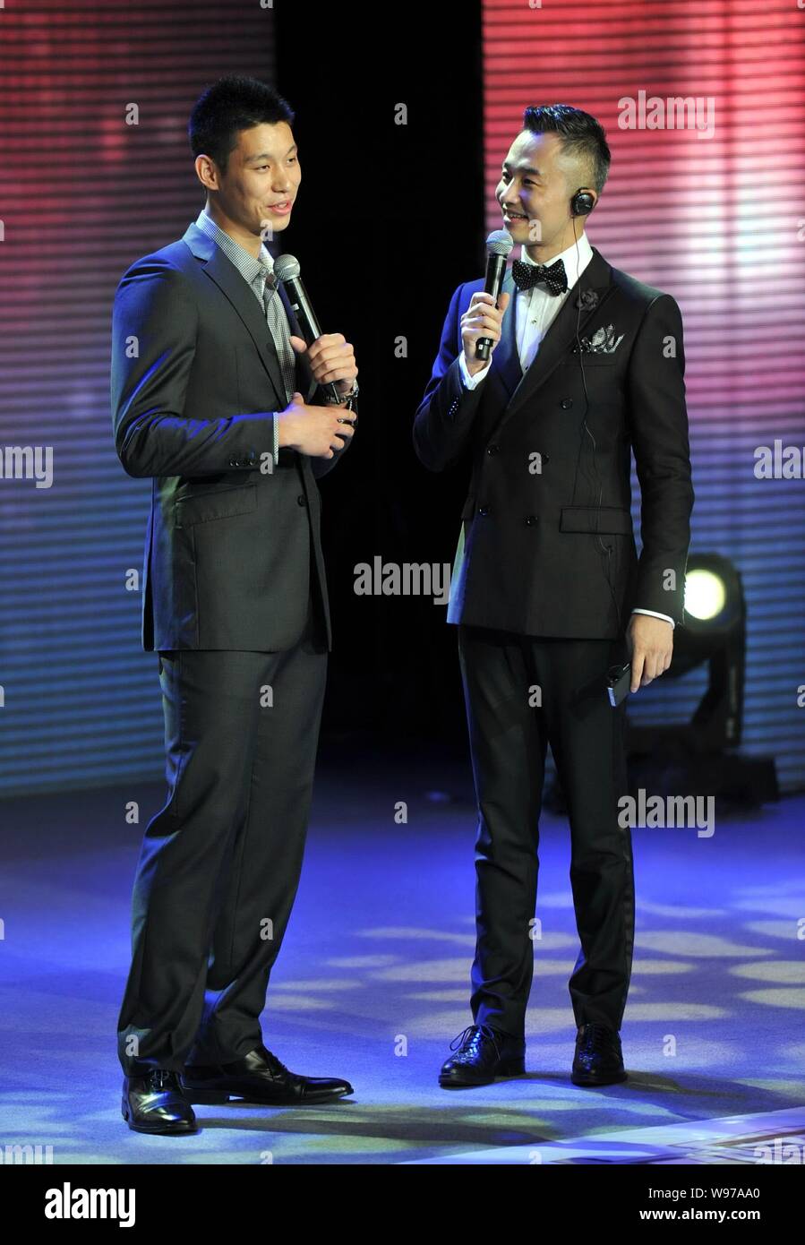 NBA basketball star Jeremy Lin (L) speaks at a TV show during his ...