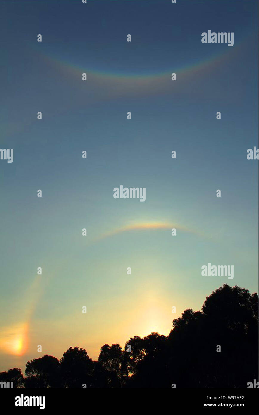 A solar halo and an upside-down rainbow are seen in the sky in Taicang ...