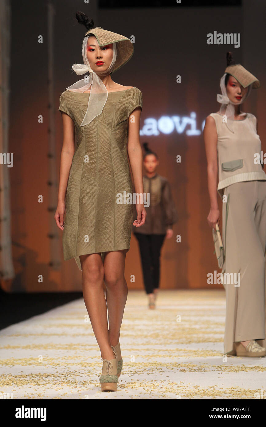 Models display new creations in the La Vie fashion show during the ...