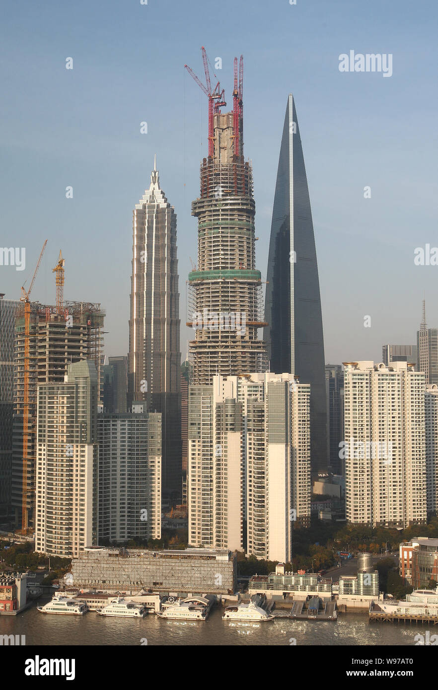The Shanghai Tower (center) is under construction next to Jinmao Tower ...