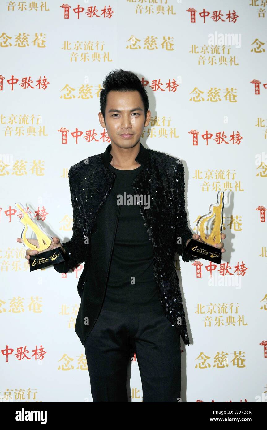 Hong Kong singer and actor Wallace Chung poses during a music award ...