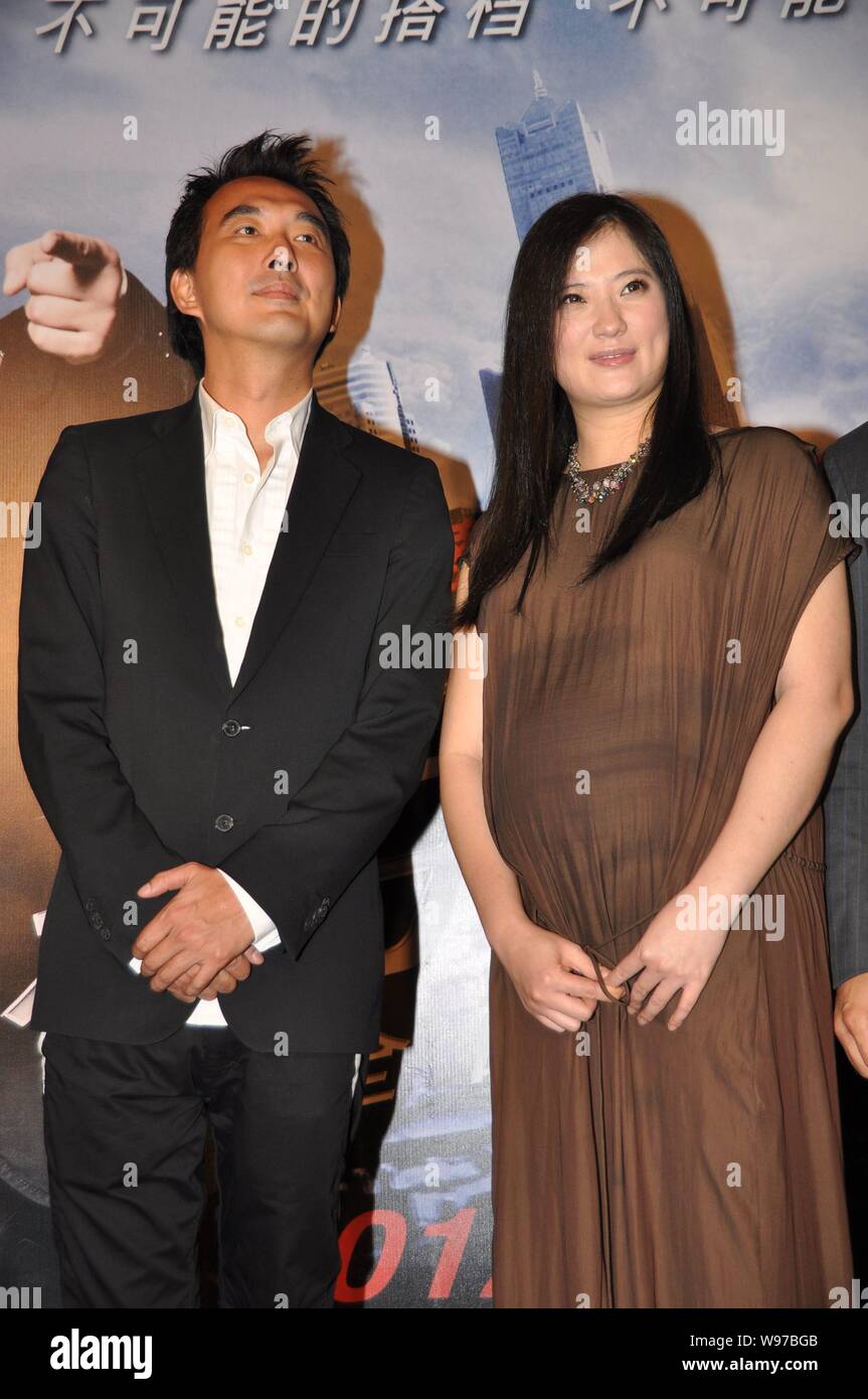 Taiwanese director Yueh-Hsun Tsai, his wife actress Yu Hsiao-Hui pose at the grand premiere of ...