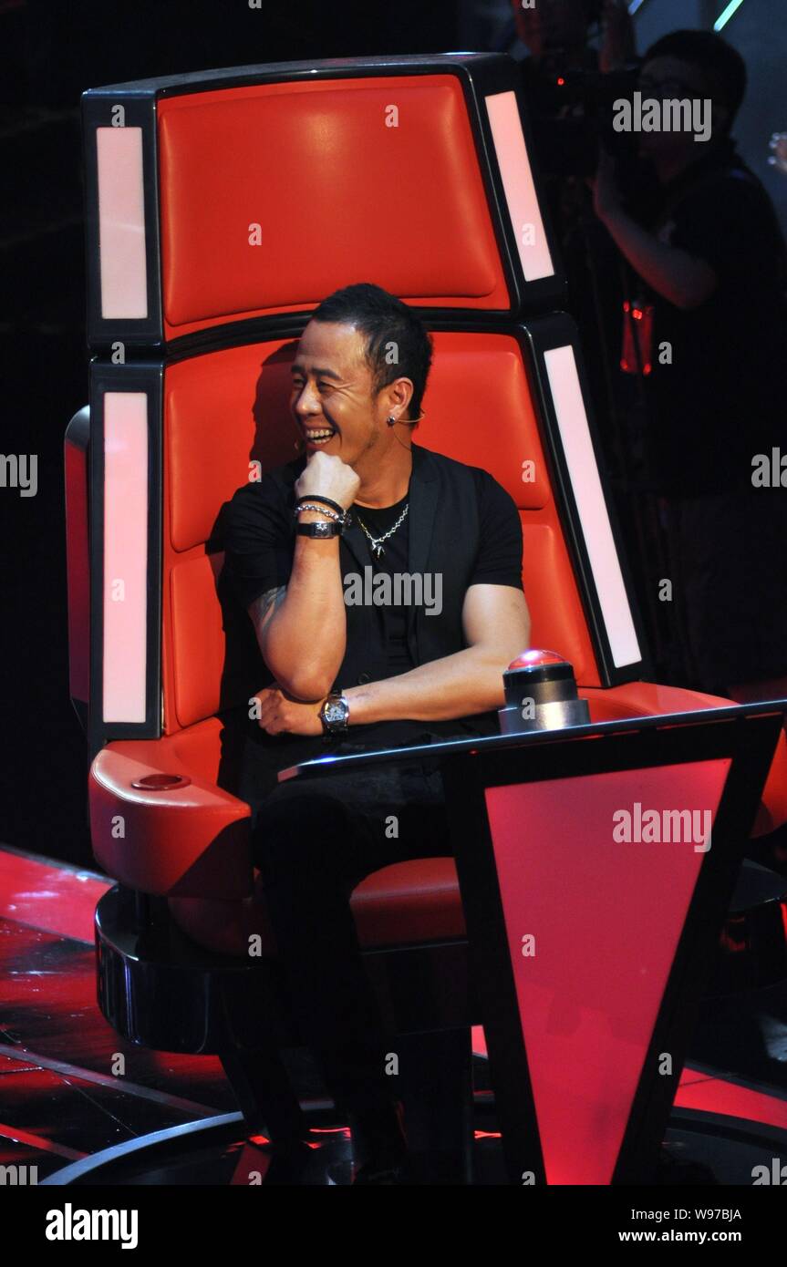 Chinese singer Yang Kun attends a talent show, The Voice China, first ...
