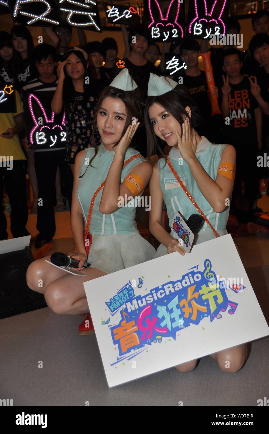 Yumi Bai Wei-Ling, left, and Miko Bai Wei-Fen of Singaporean pop twins ...