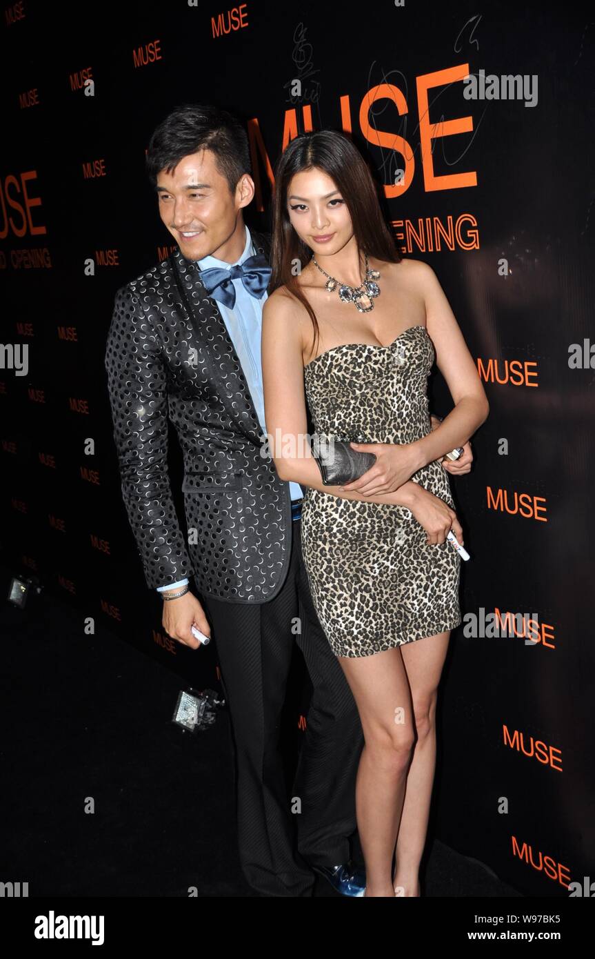 Chinese model and actor Hu Bin and Taiwanese model Patina Lin pose during the opening party for ...