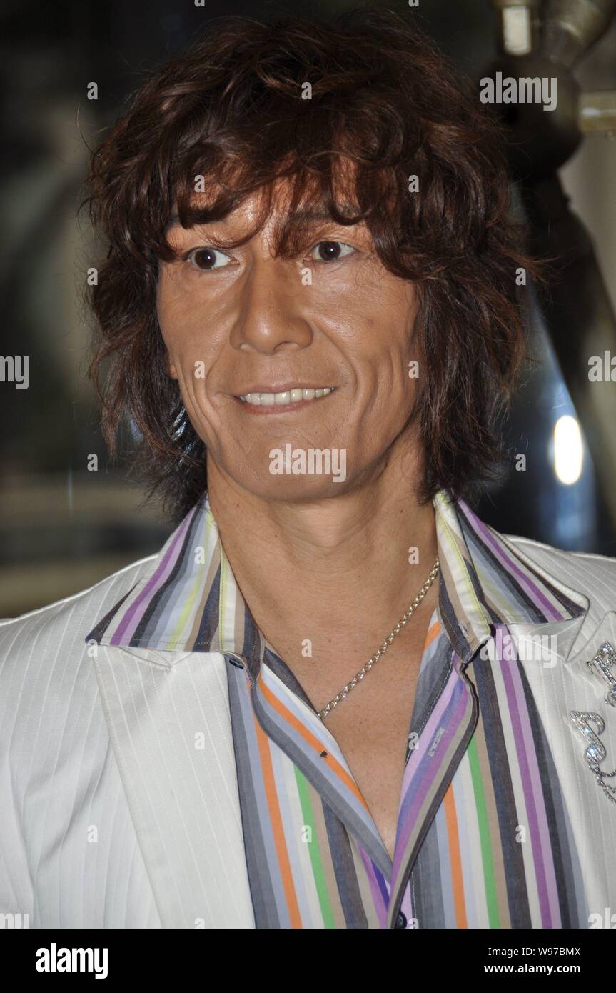 Japanese male adult video (AV) actor Taka Kato is pictured during the China Adult-Care Expo 2012 ...