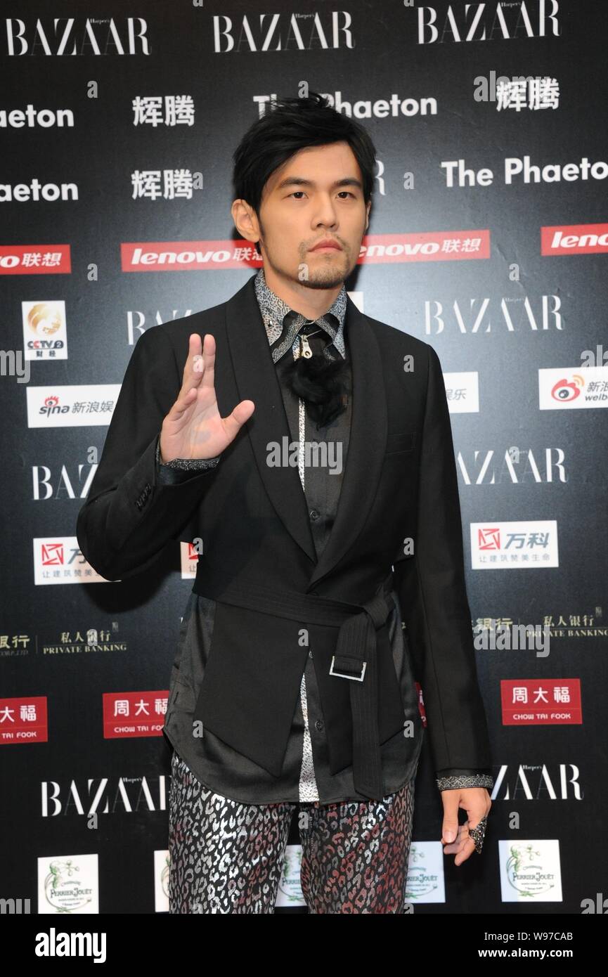 Taiwanese singer and actor Jay Chou poses on the red carpet as he ...