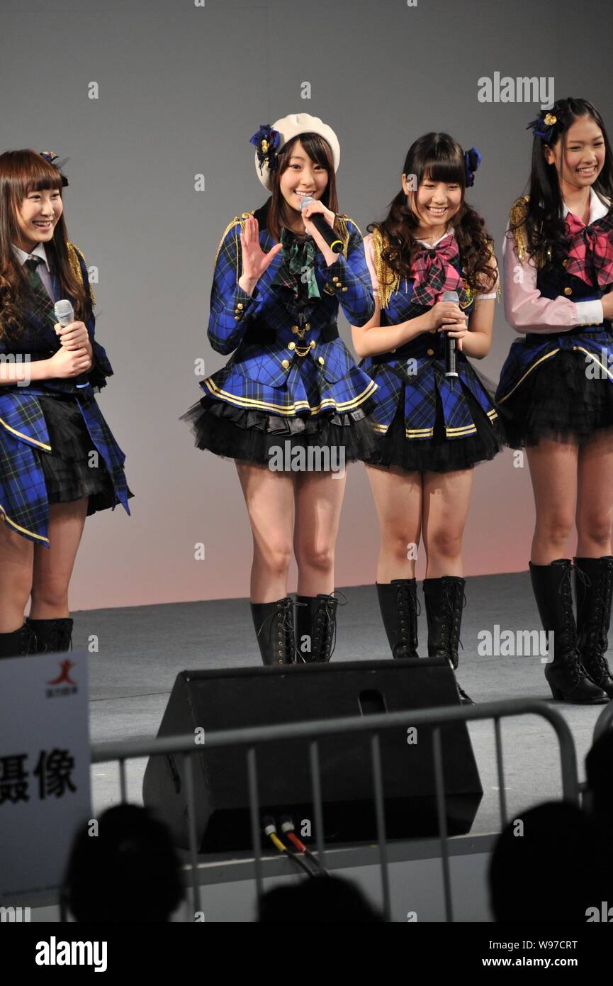 Members of Japanese female idol group AKB48 are pictured at their ...