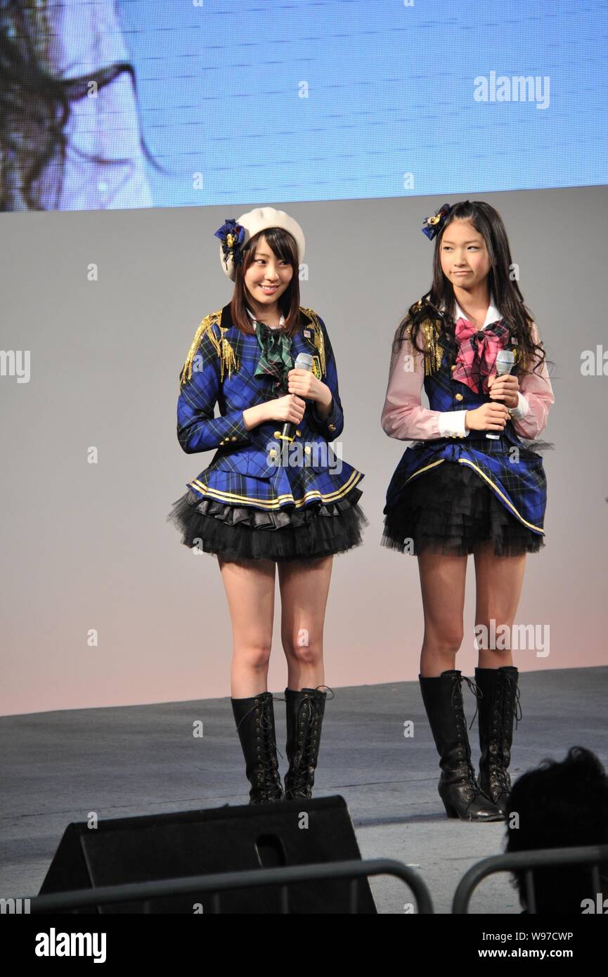 Members of Japanese female idol group AKB48 are pictured at their ...