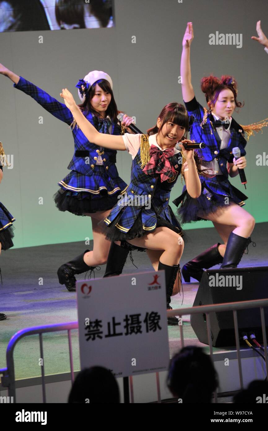 Members of Japanese female idol group AKB48 perform at their concert in ...