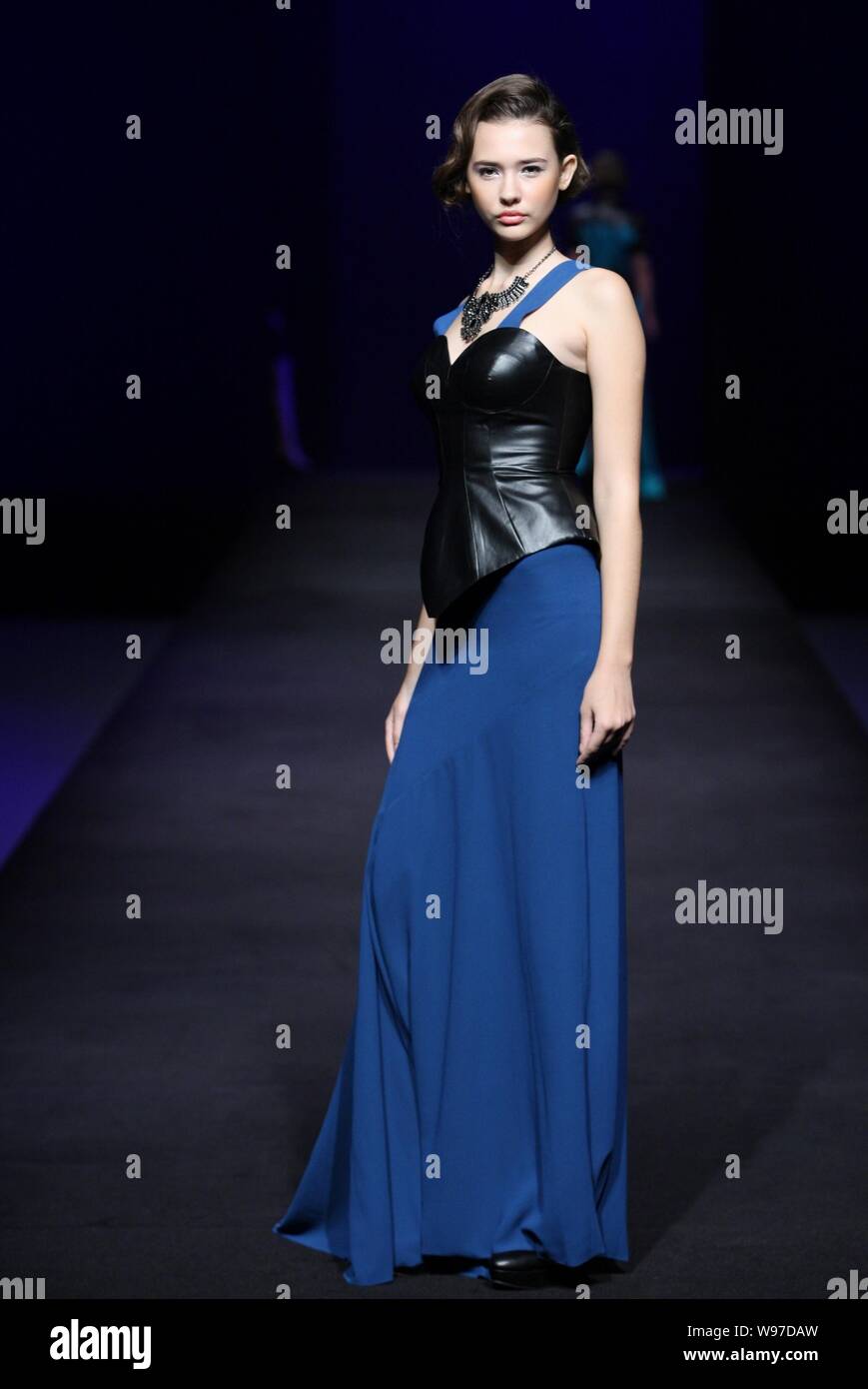 A model displays a new creation by Chinese designer Tanya Wang Yannan ...