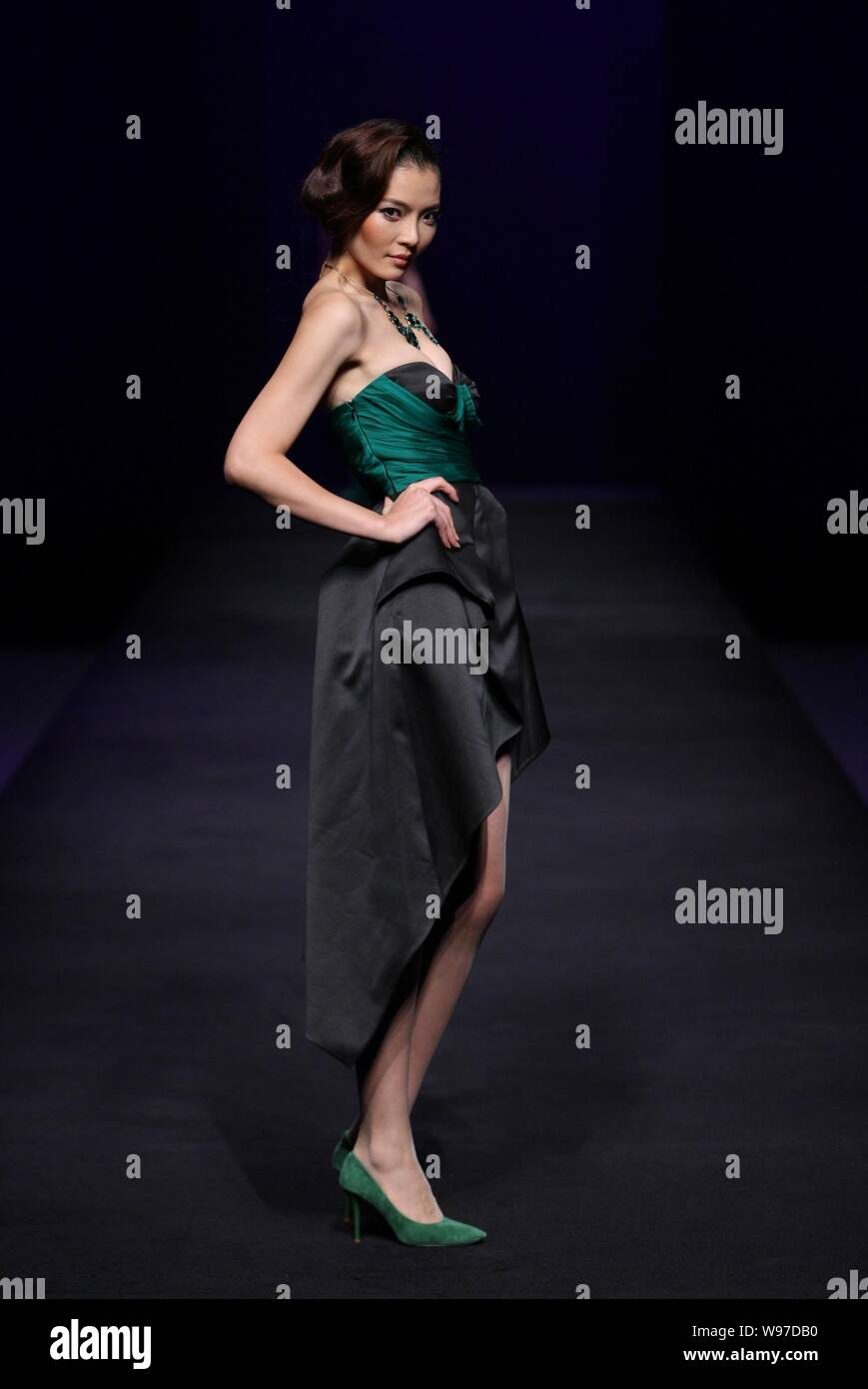 A model displays a new creation by Chinese designer Tanya Wang Yannan ...