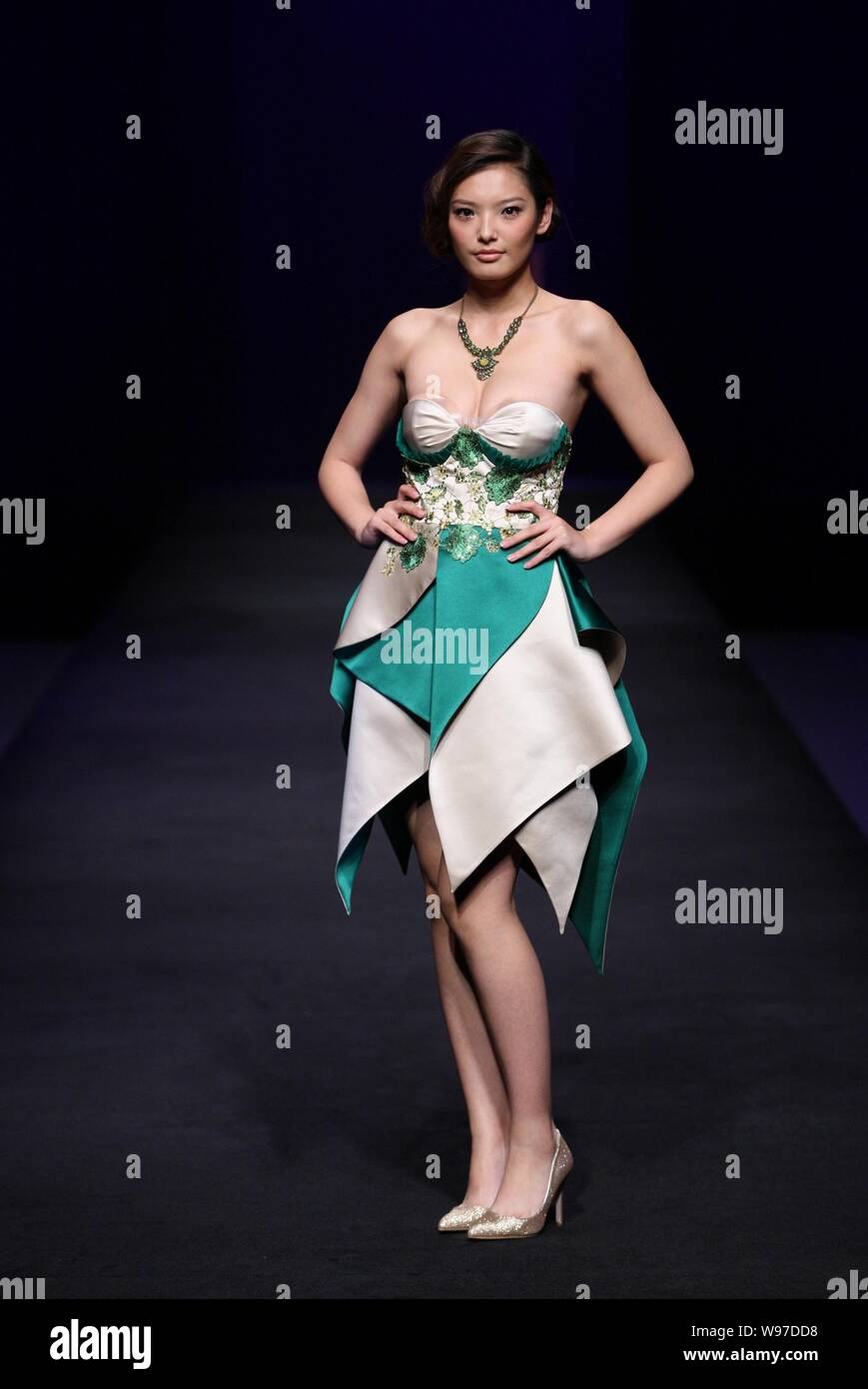 A model displays a new creation by Chinese designer Tanya Wang Yannan ...