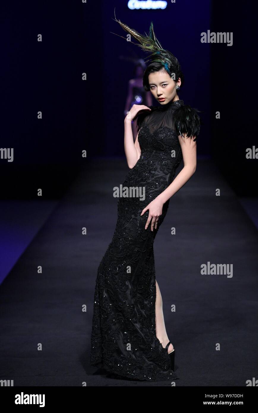 A model displays a new creation by Chinese designer Tanya Wang Yannan ...