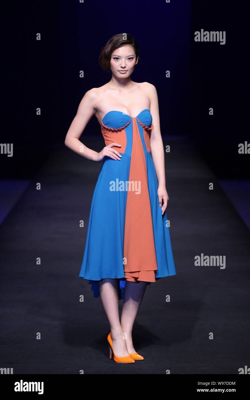 A model displays a new creation by Chinese designer Tanya Wang Yannan ...