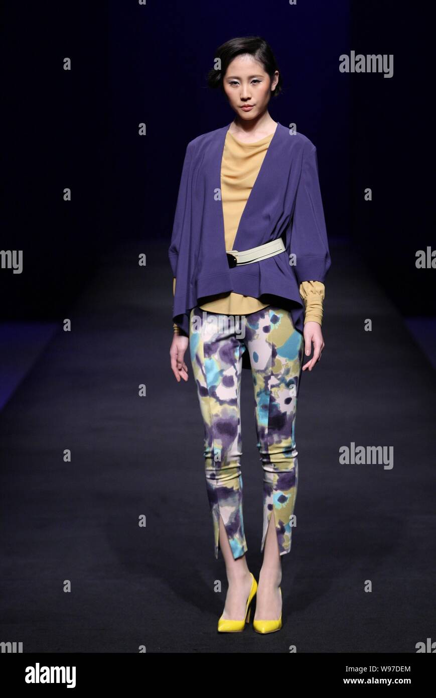 A model displays a new creation by Chinese designer Tanya Wang Yannan ...