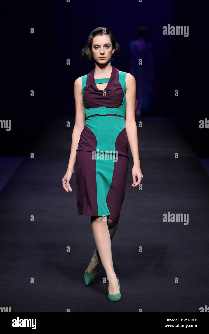 A model displays a new creation by Chinese designer Tanya Wang Yannan ...