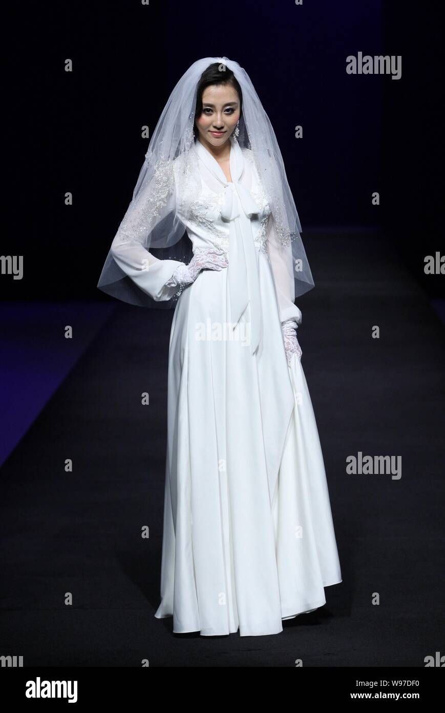 A model displays a new creation by Chinese designer Tanya Wang Yannan ...