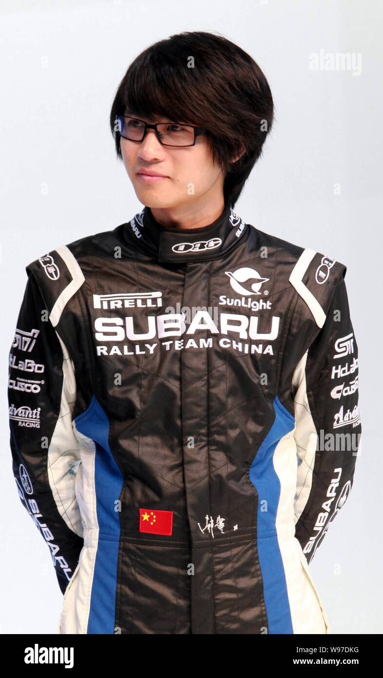 Chinese professional rally driver Han Han is pictured during the 12th ...