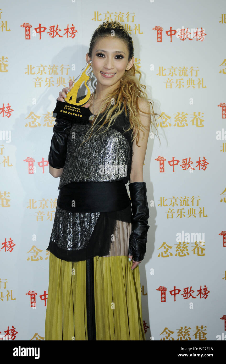 Malaysian singer Penny Tai poses during a music award ceremony in ...