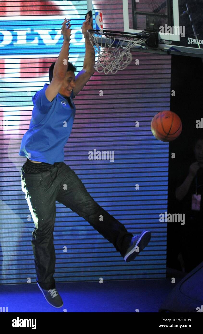 NBA basketball star Jeremy Lin dunks at a TV show during his Linsanity ...