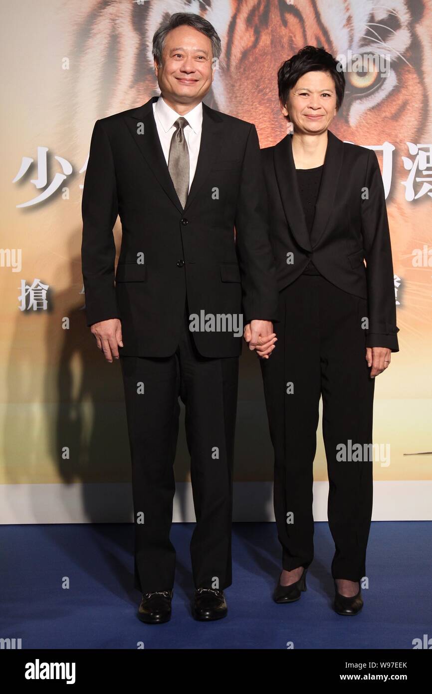 Taiwanese film director Ang Lee, left, poses with his wife during a ...
