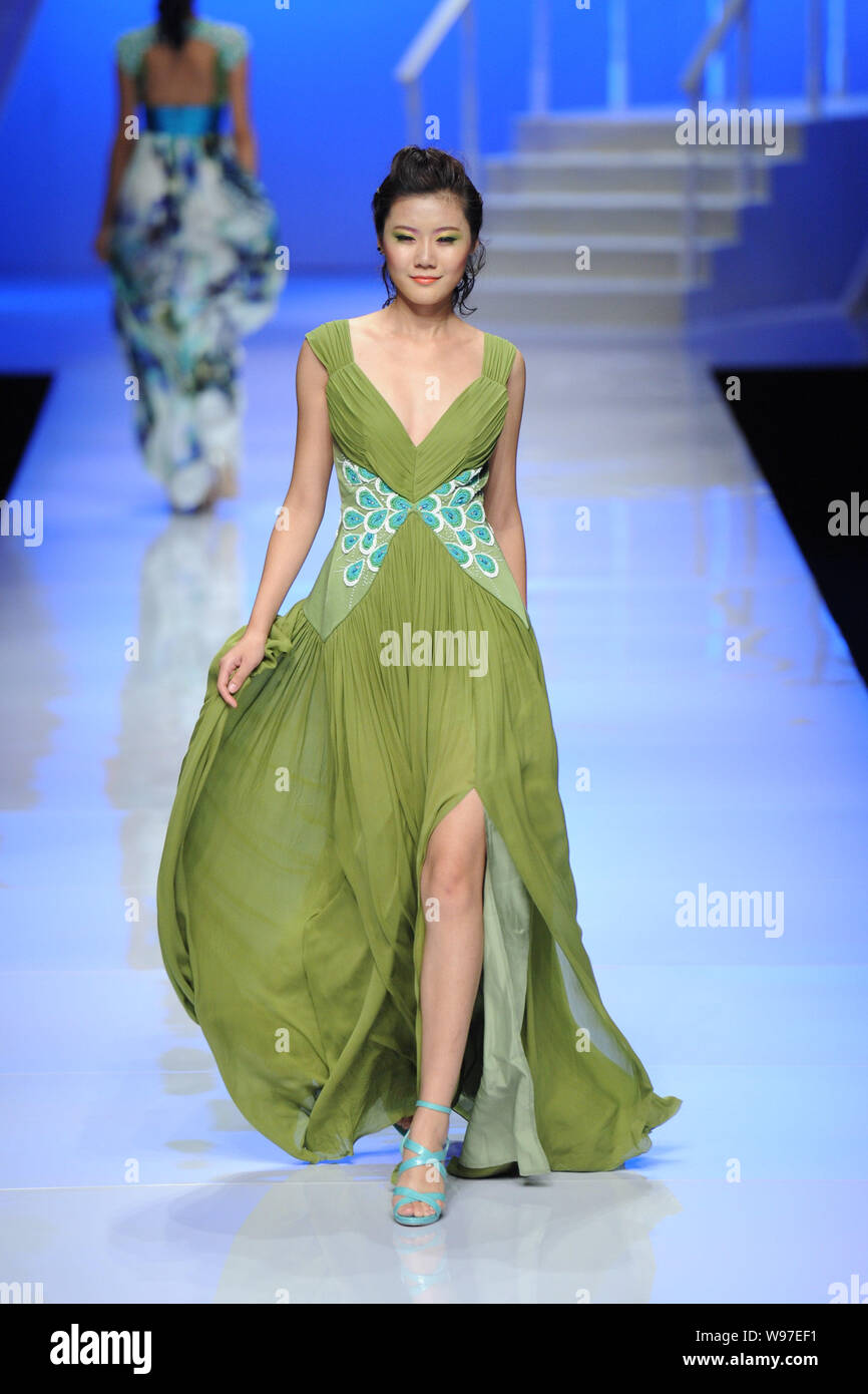 A model displays a new creation by Hong Kong designer Dorian Ho in the ...