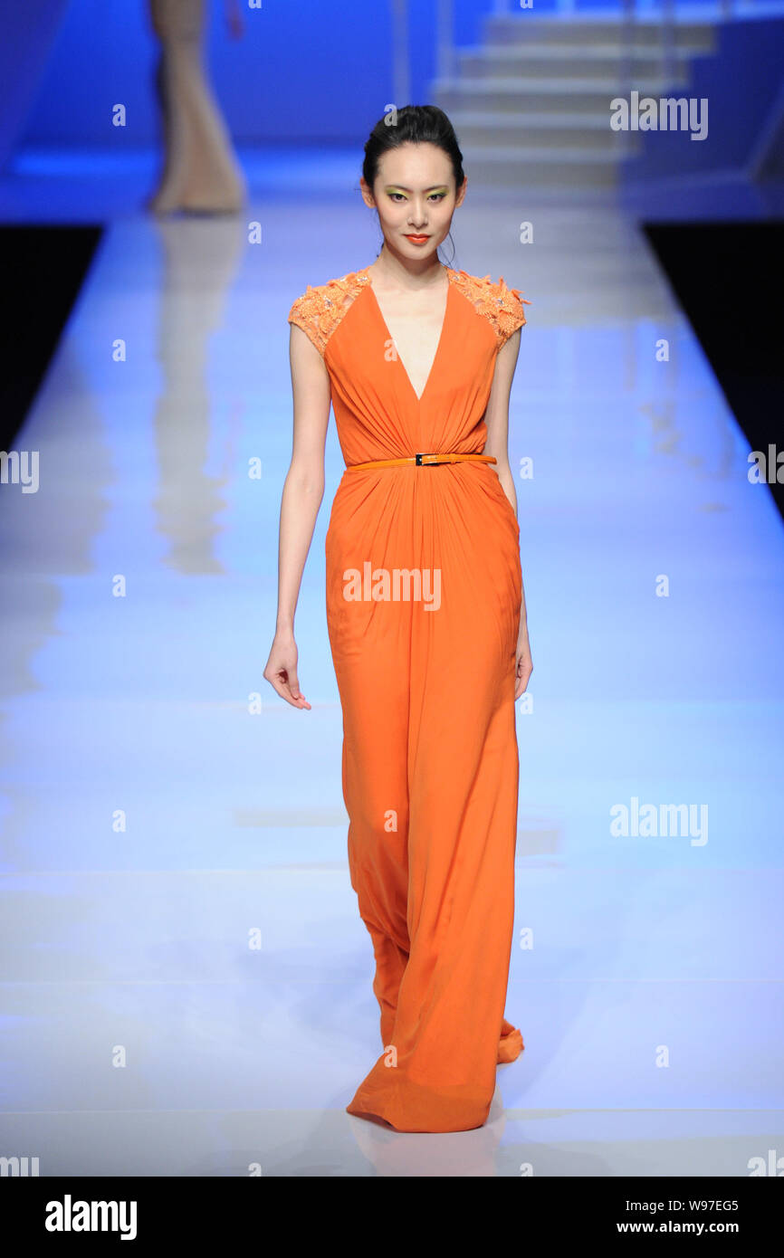 A model displays a new creation by Hong Kong designer Dorian Ho in the ...