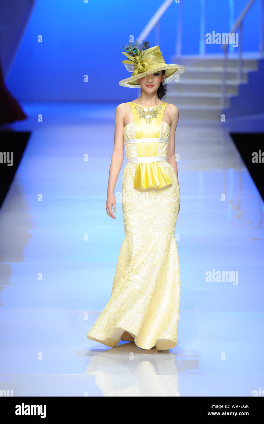 A model displays a new creation by Hong Kong designer Dorian Ho in the ...