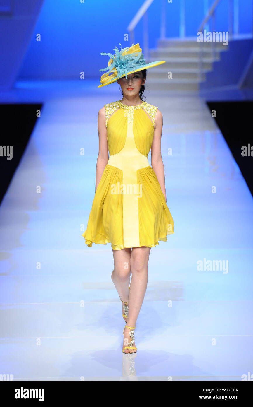 A model displays a new creation by Hong Kong designer Dorian Ho in the ...