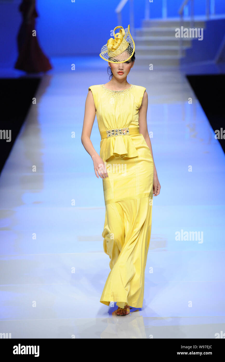 Chinese model Mo Wandan displays a new creation by Hong Kong designer ...