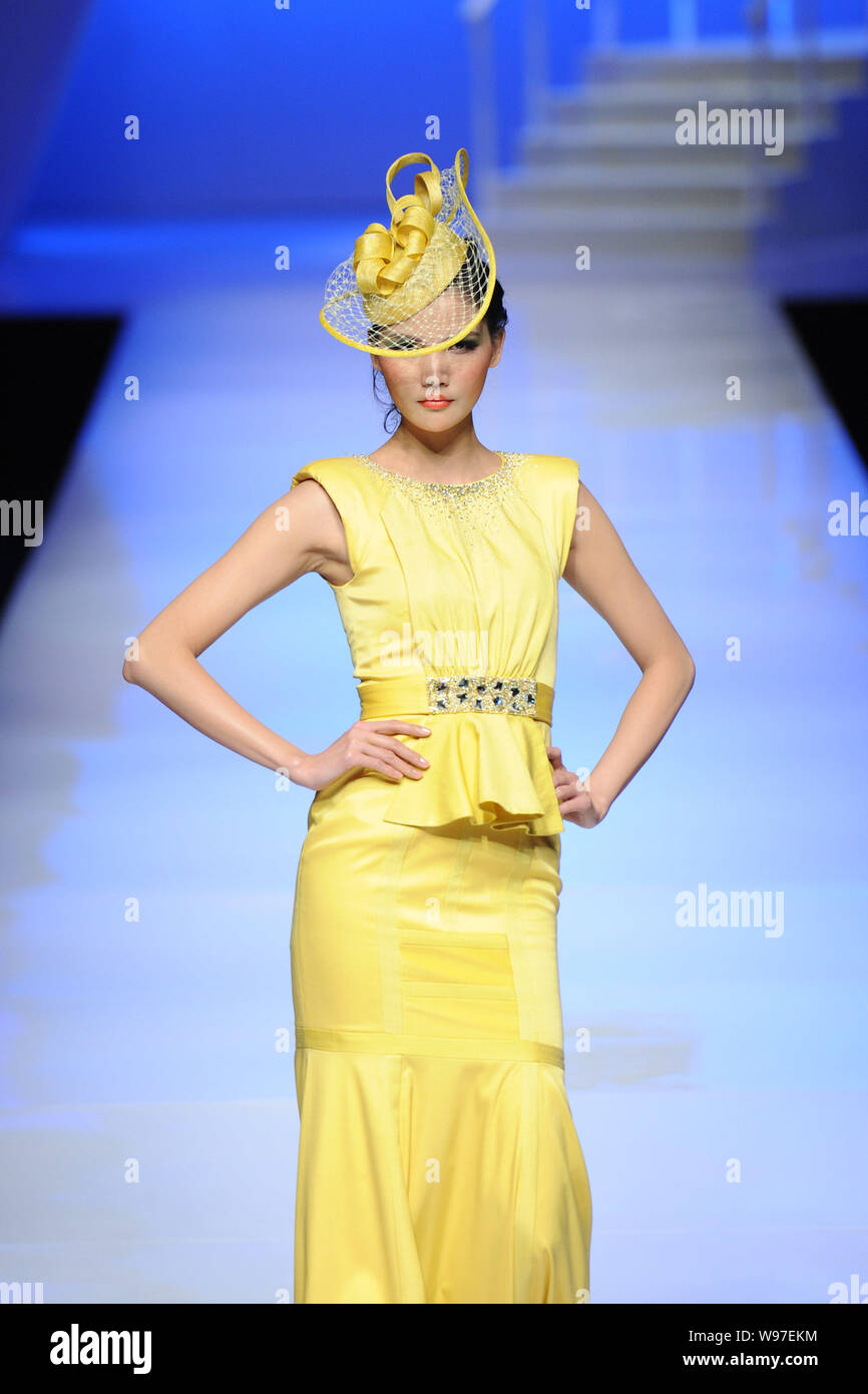 Chinese model Mo Wandan displays a new creation by Hong Kong designer ...