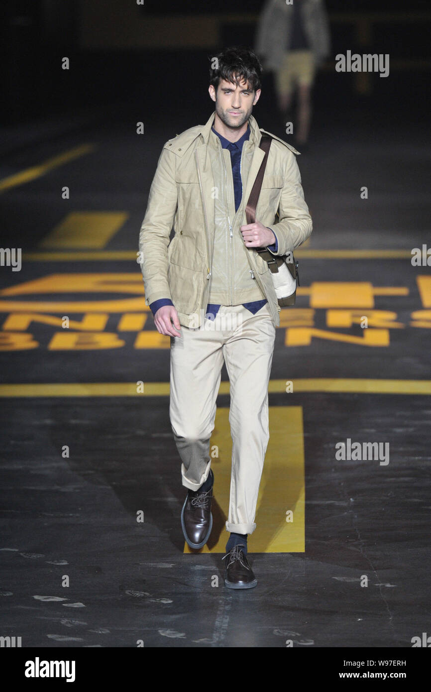 A model displays a new creation in the Cabbeen fashion show during the ...