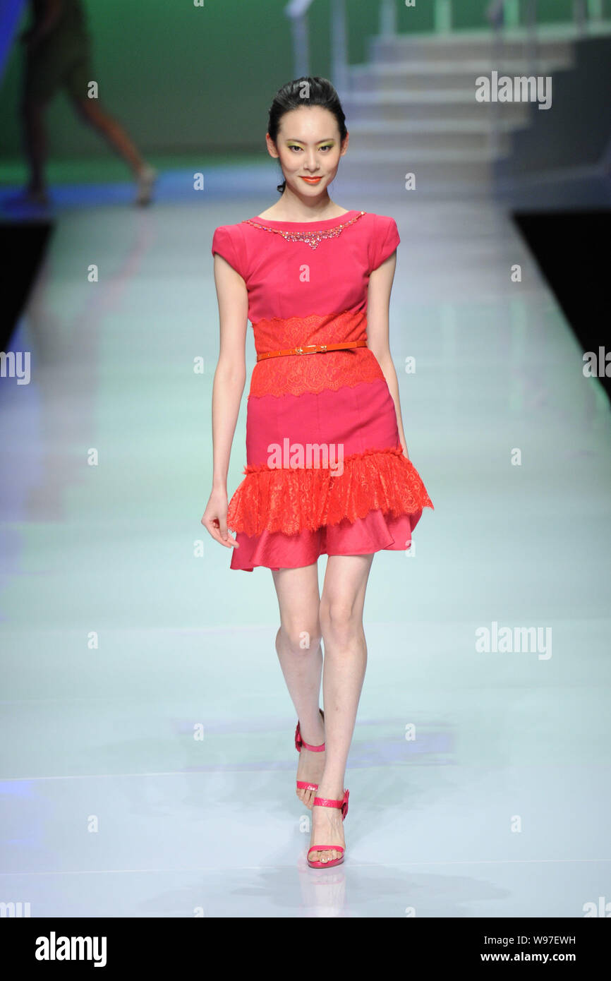 A model displays a new creation by Hong Kong designer Dorian Ho in the ...