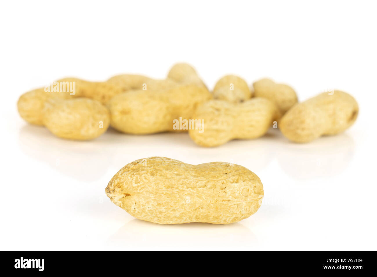 Lot of whole natural yellow peanut isolated on white background Stock ...