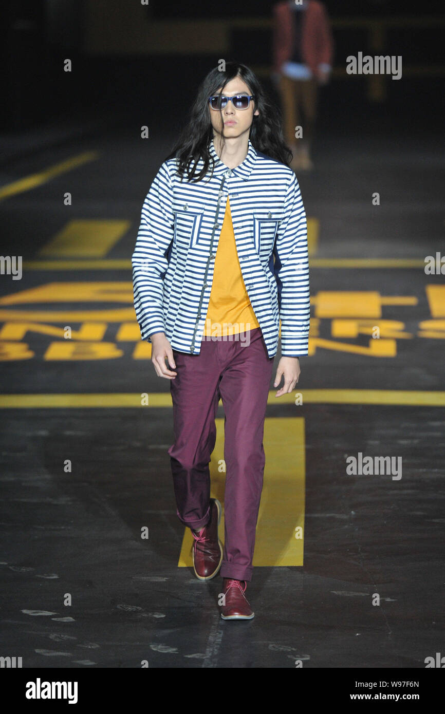 A model displays a new creation in the Cabbeen fashion show during the ...
