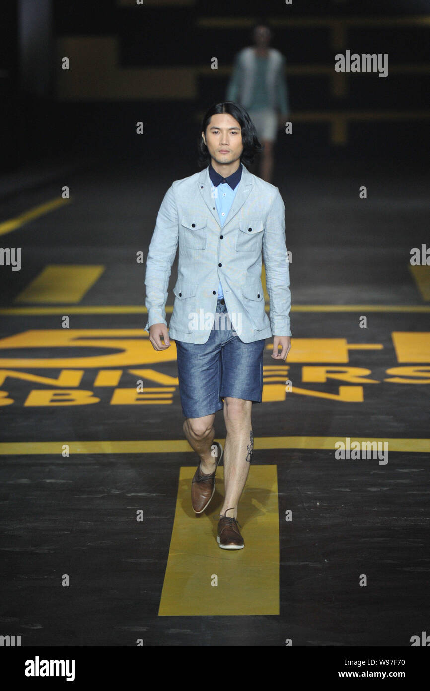 A model displays a new creation in the Cabbeen fashion show during the ...