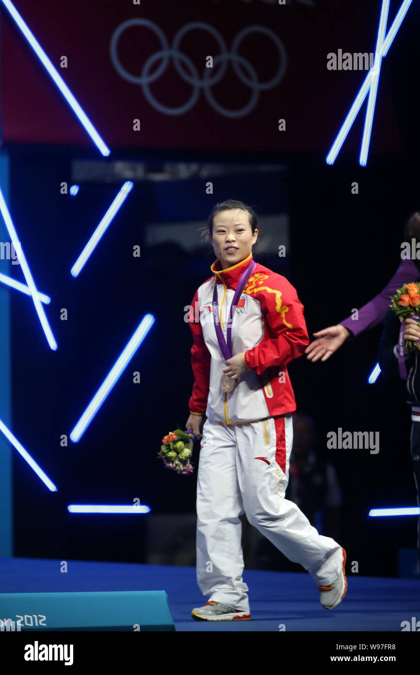 Gold medalist Wang Mingjuan of China is pictured at the award ceremony ...