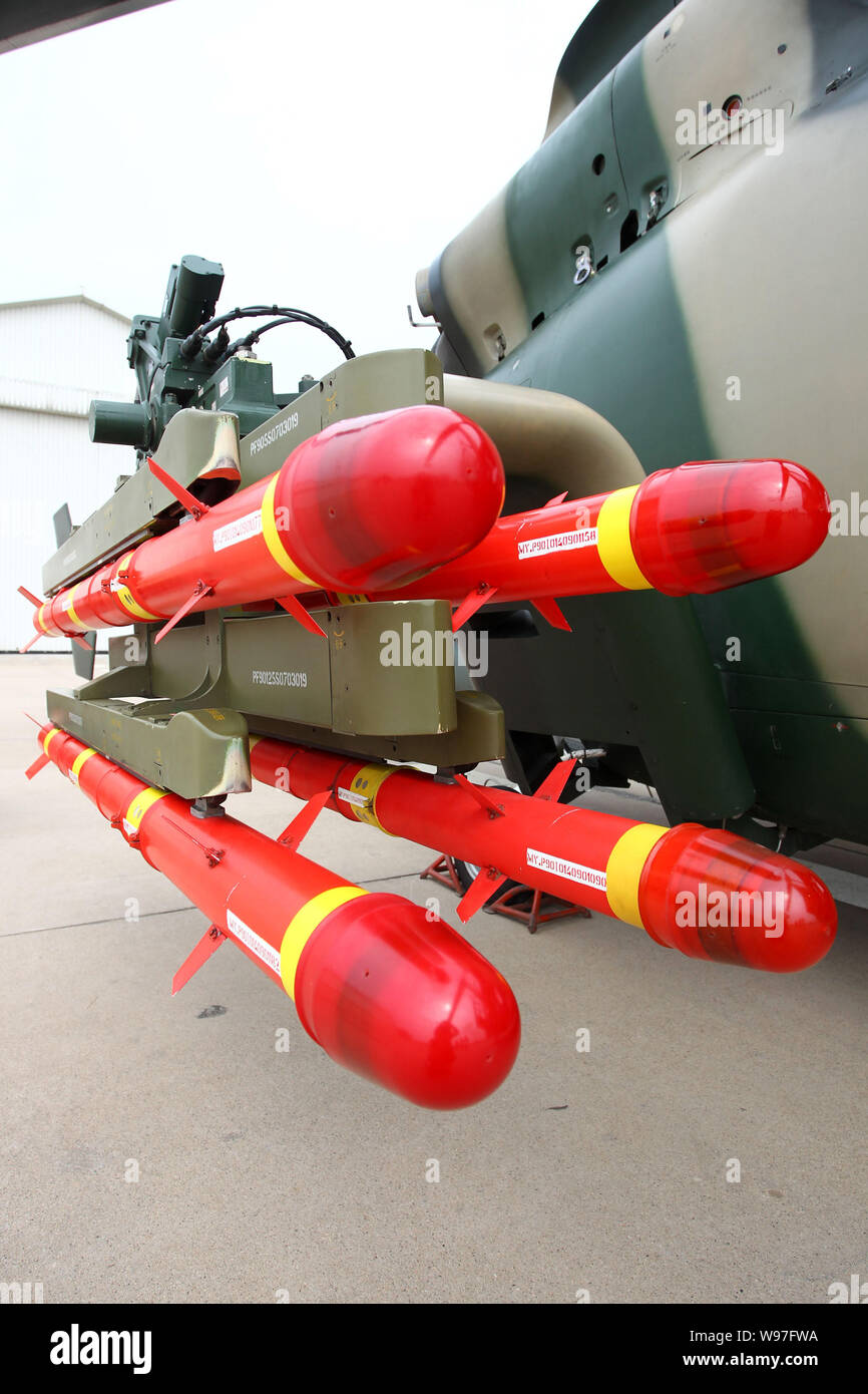 A Z-9WZ attack helicopter equipped with missiles is displayed during a ...