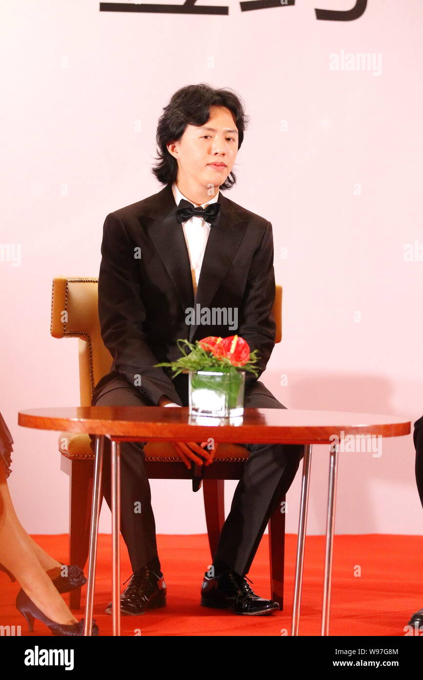 Chinese pianist Li Yundi is pictured during his signing ceremony with ...
