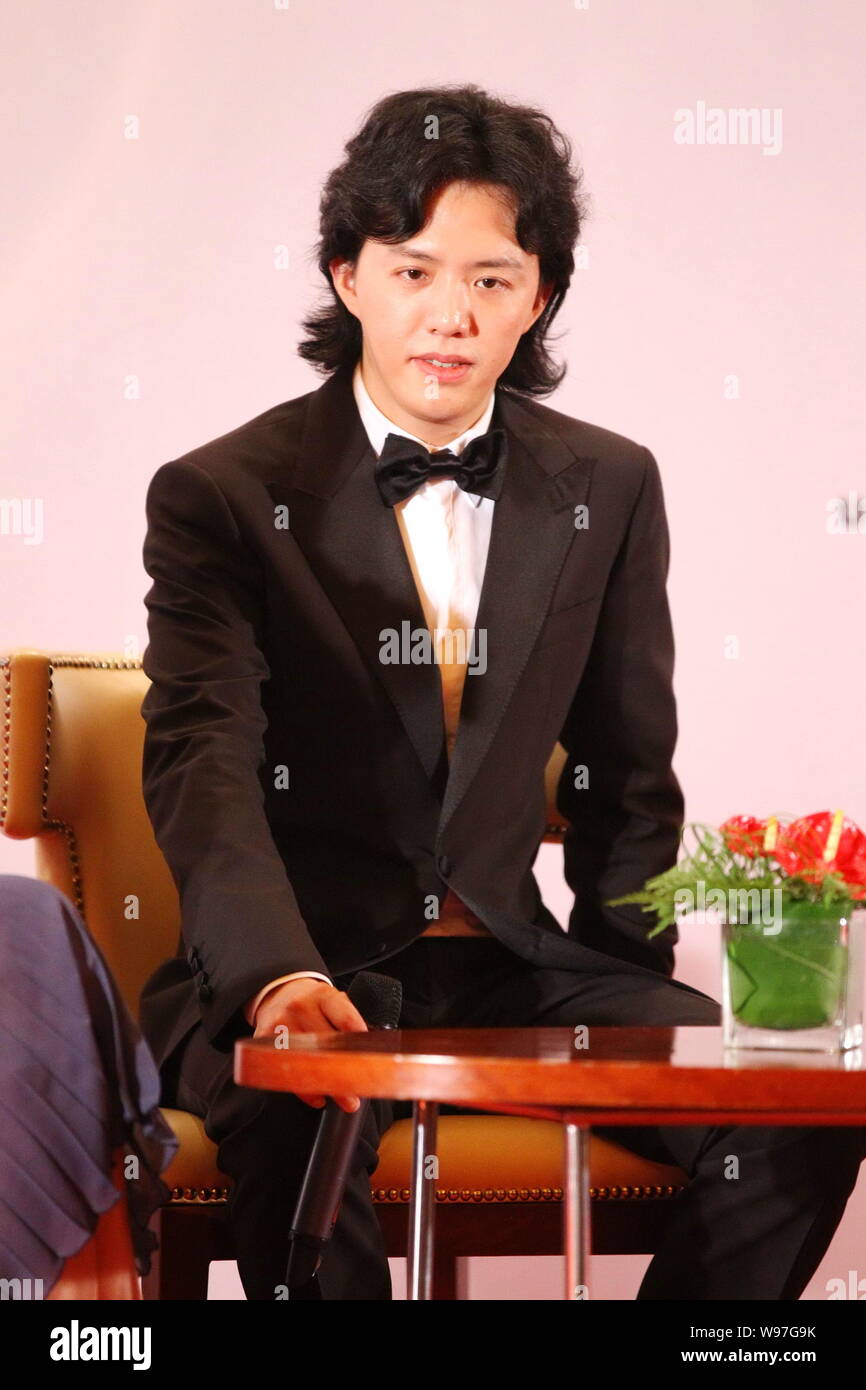 Chinese pianist Li Yundi is pictured during his signing ceremony with ...