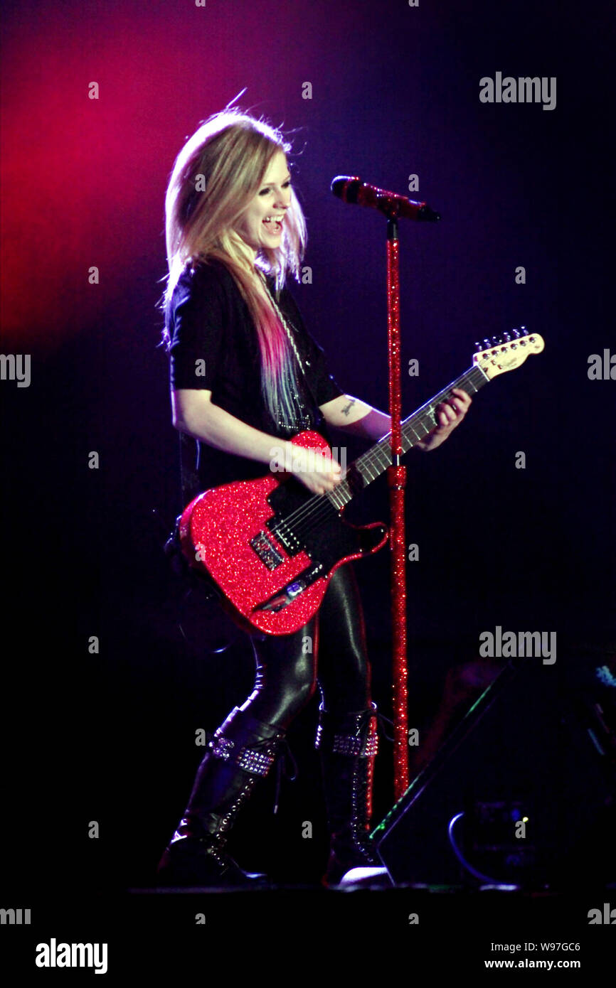 Canadian singer Avril Lavigne performs at a concert during her world ...