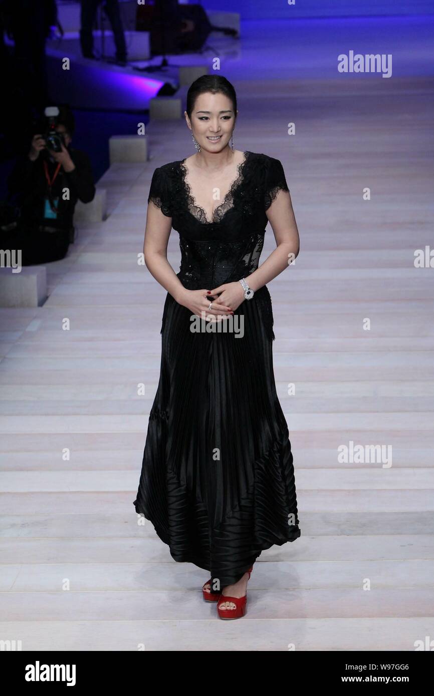 Chinese actress Gong Li is pictured at the Aimer 2012 swimwear fashion ...