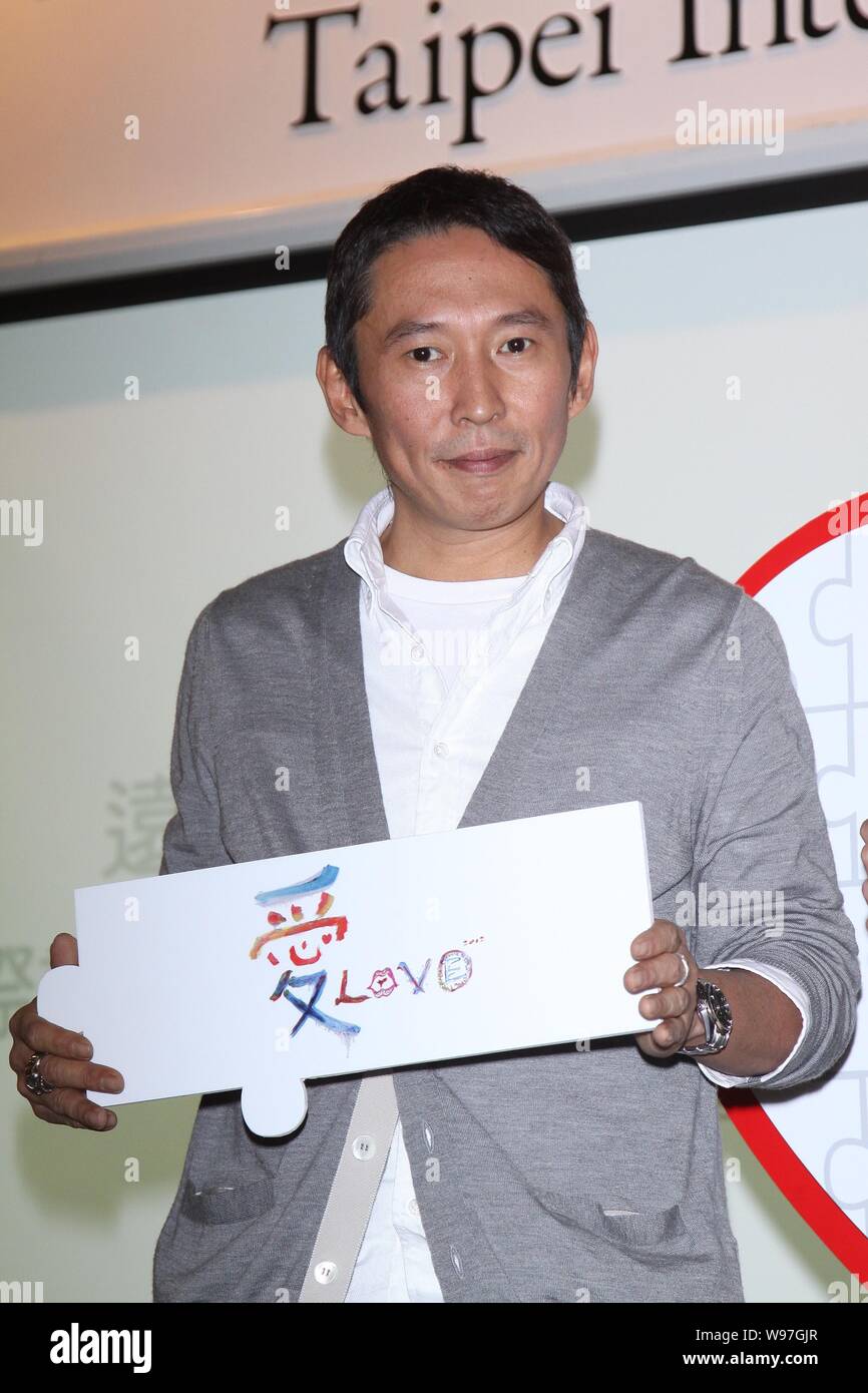 Taiwanese director Doze Niu poses during a promotion al activity for ...