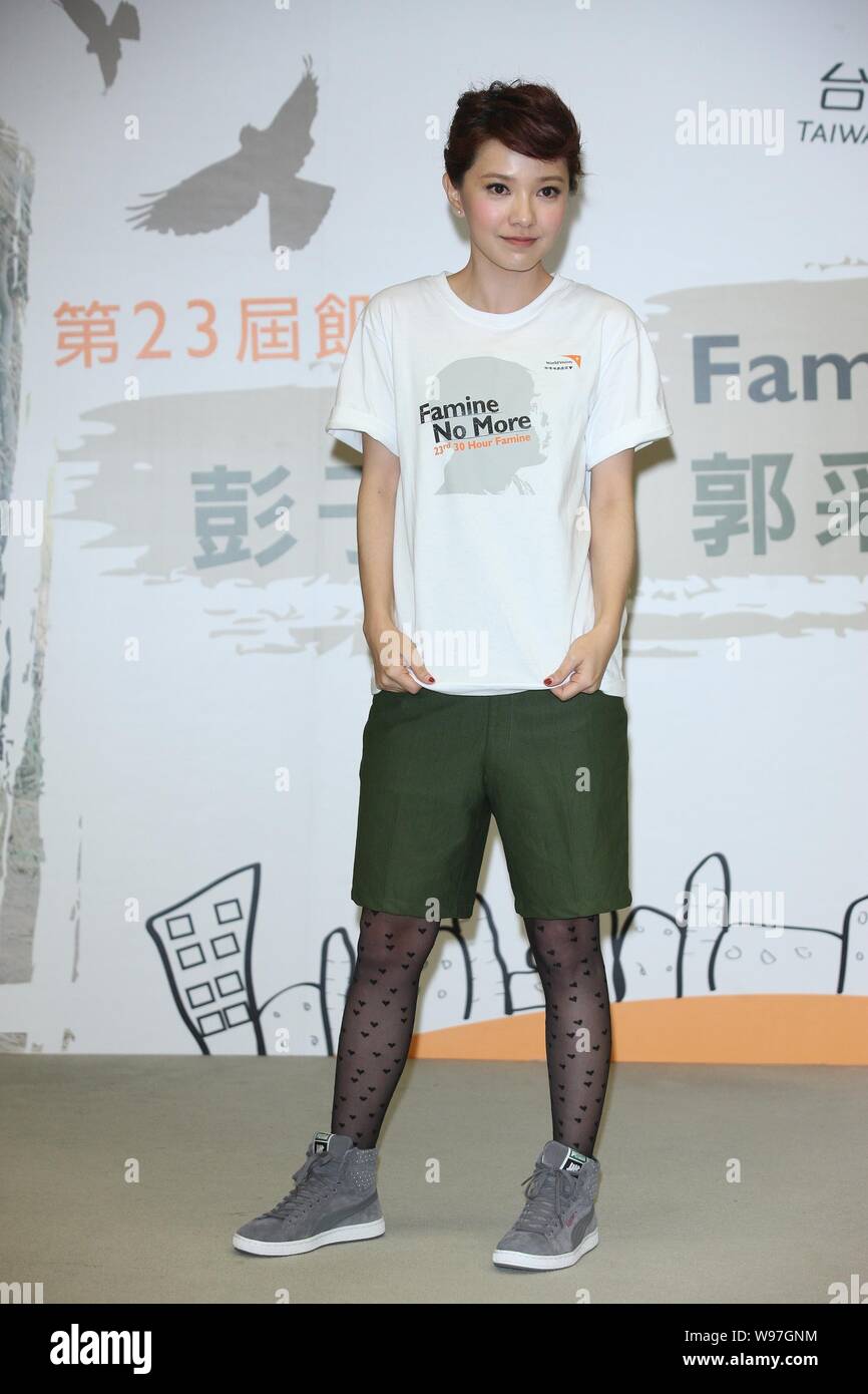 Taiwanese singer and actress Amber Kuo poses during a press conference ...