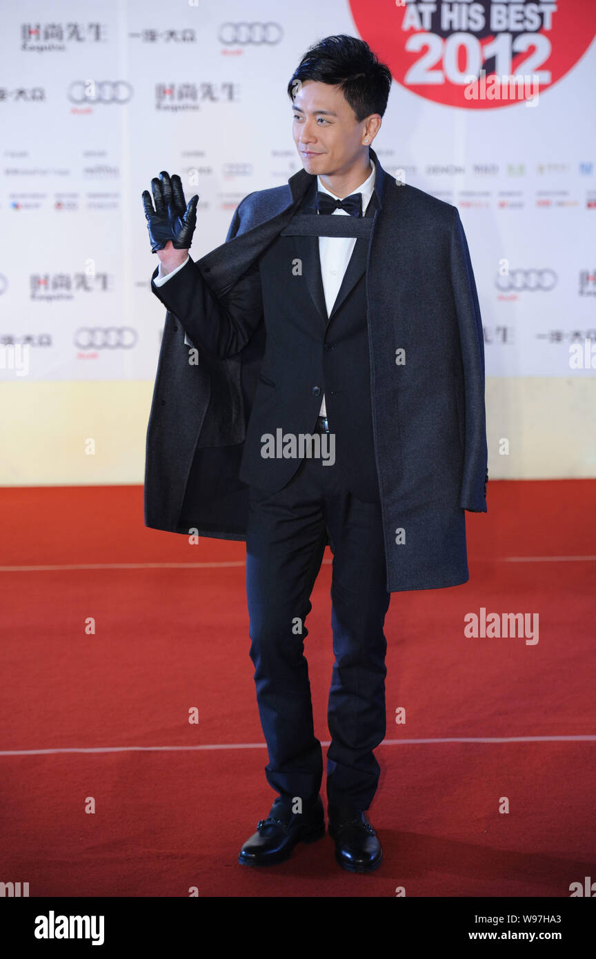 Hong Kong actor Bosco Wong poses as he arrives for a gala by Esquire ...